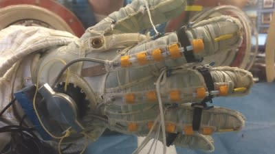 New Capabilities for Grasp-Assisting Gloves - Tech Briefs