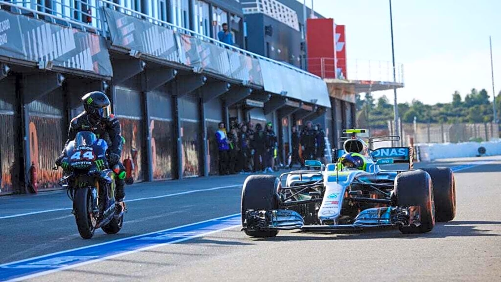 MotoGP boss predicts how F1 star Lewis Hamilton would perform in bike racing | Yardbarker