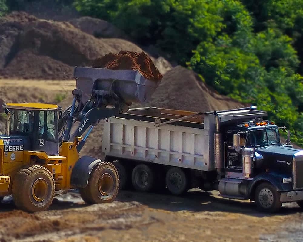 Aggregate Delivery | Dump Truck Rentals | Flow Gate Control | Flatbed ...