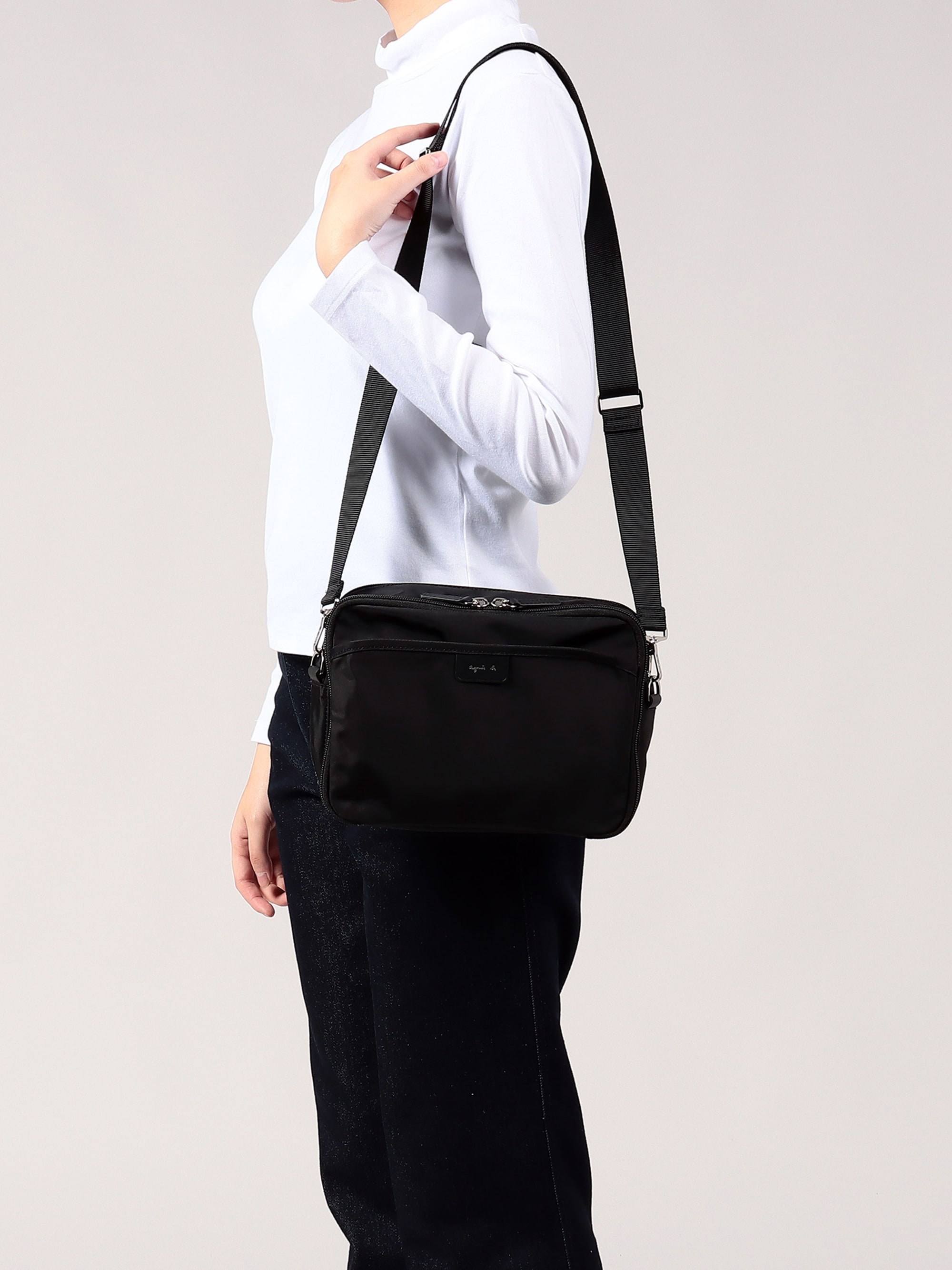black nylon shoulder bag with two compartments black nylon shoulder bag with two compartments