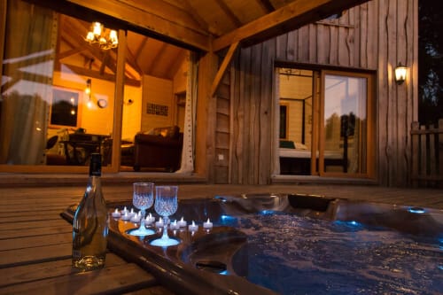 Rustic Château Treehouses with Jacuzzis in France
