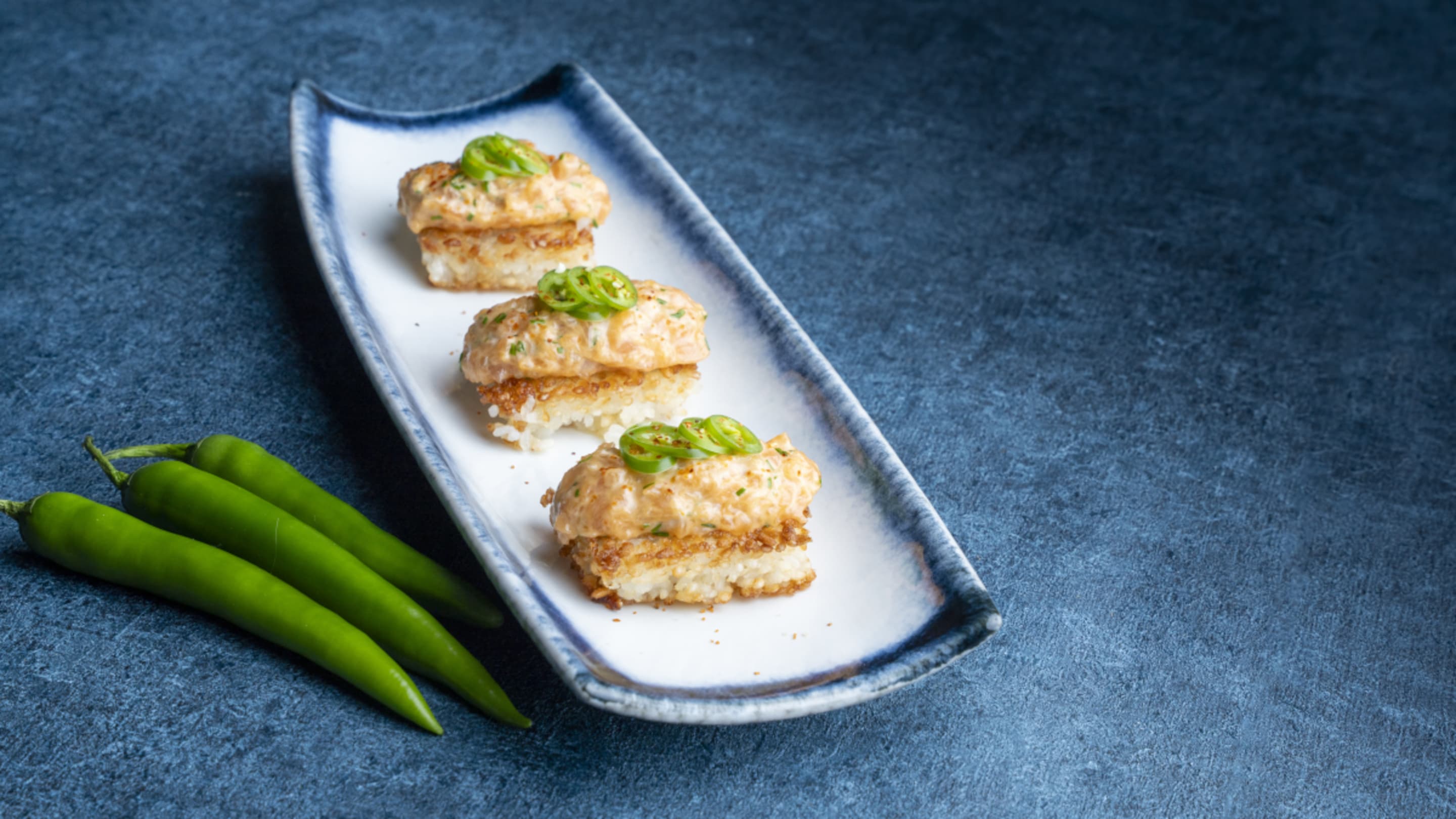 Spicy chili salmon tartare with crispy rice