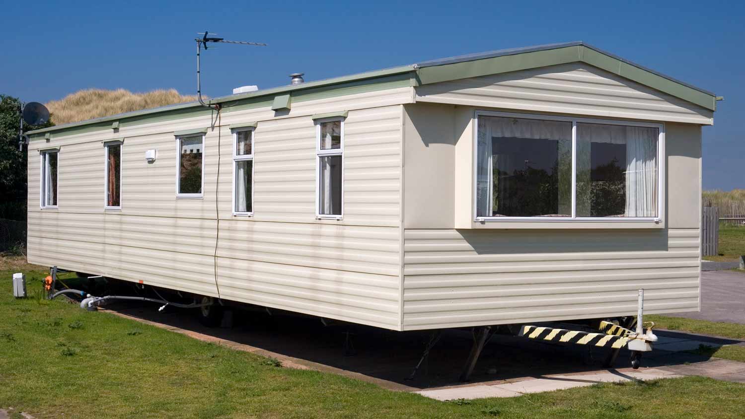 How Much Does Mobile Home Roof Replacement Cost? [2026 Data] | Angi