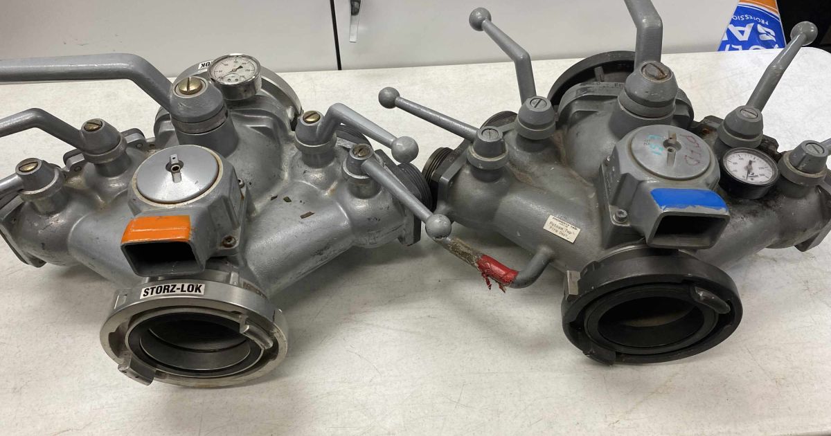 Two firefighter water manifolds - BidCorp Auctions