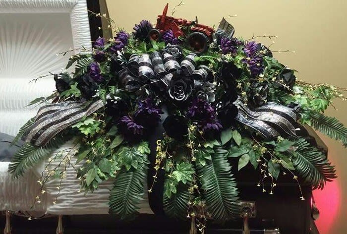 Well done (custom made male casket spray) by Anointed Flowers & Gifts
