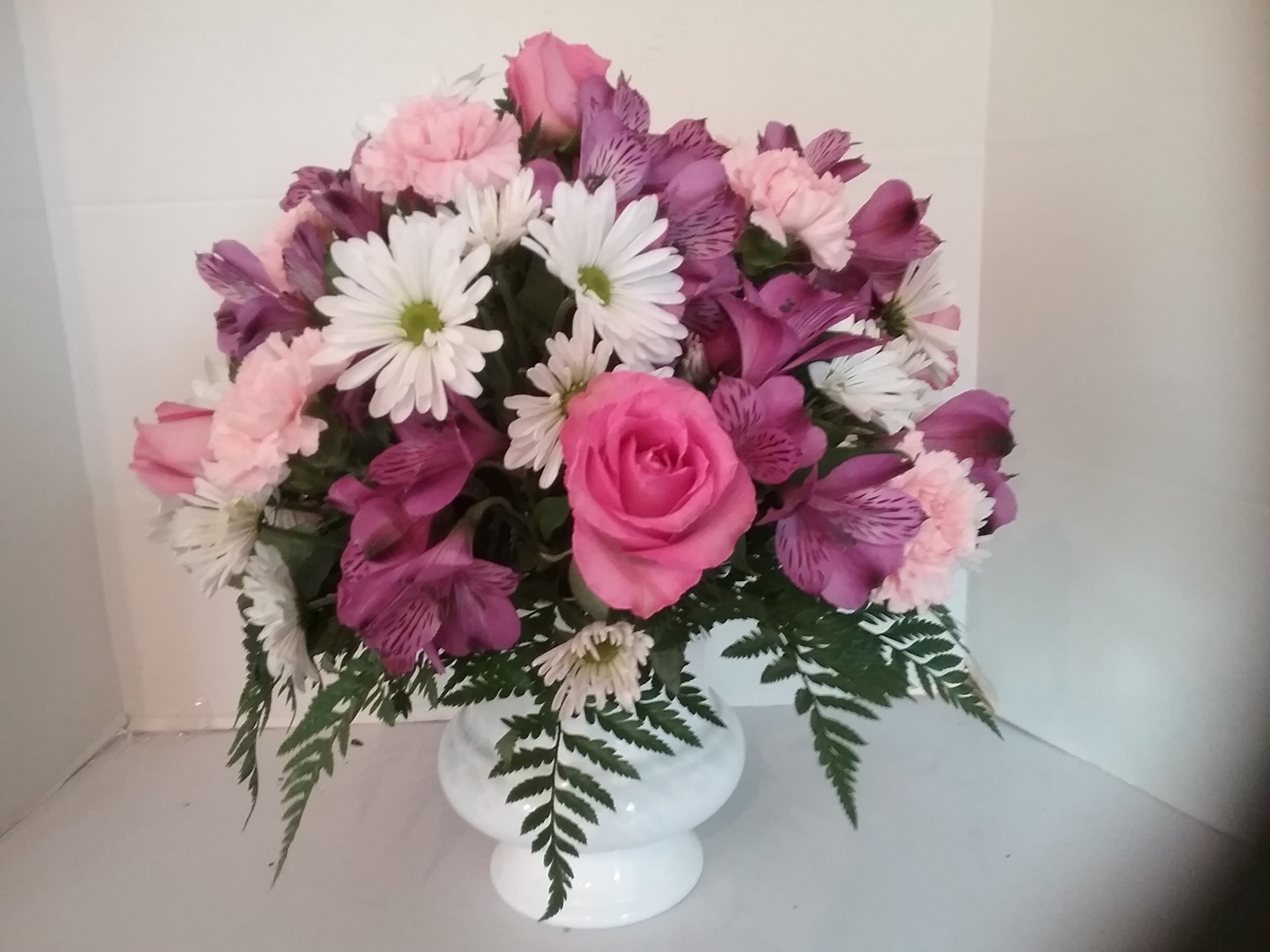 Pop of pink urn in Fulton, NY | Claudette's Flowers and Gifts