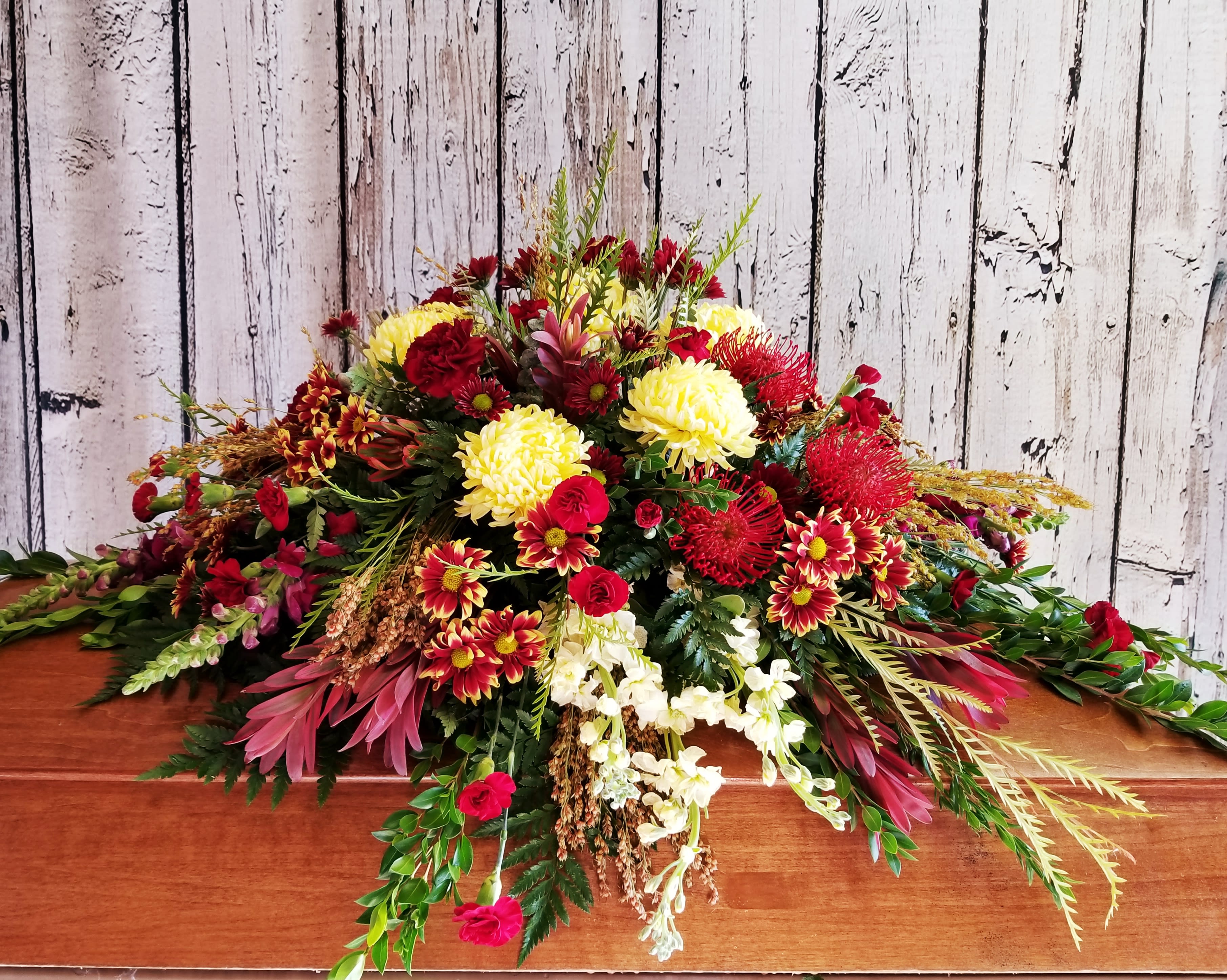 Legend in the Fall Casket Spray in Odessa, TX | Arlene's Flowers and Gifts