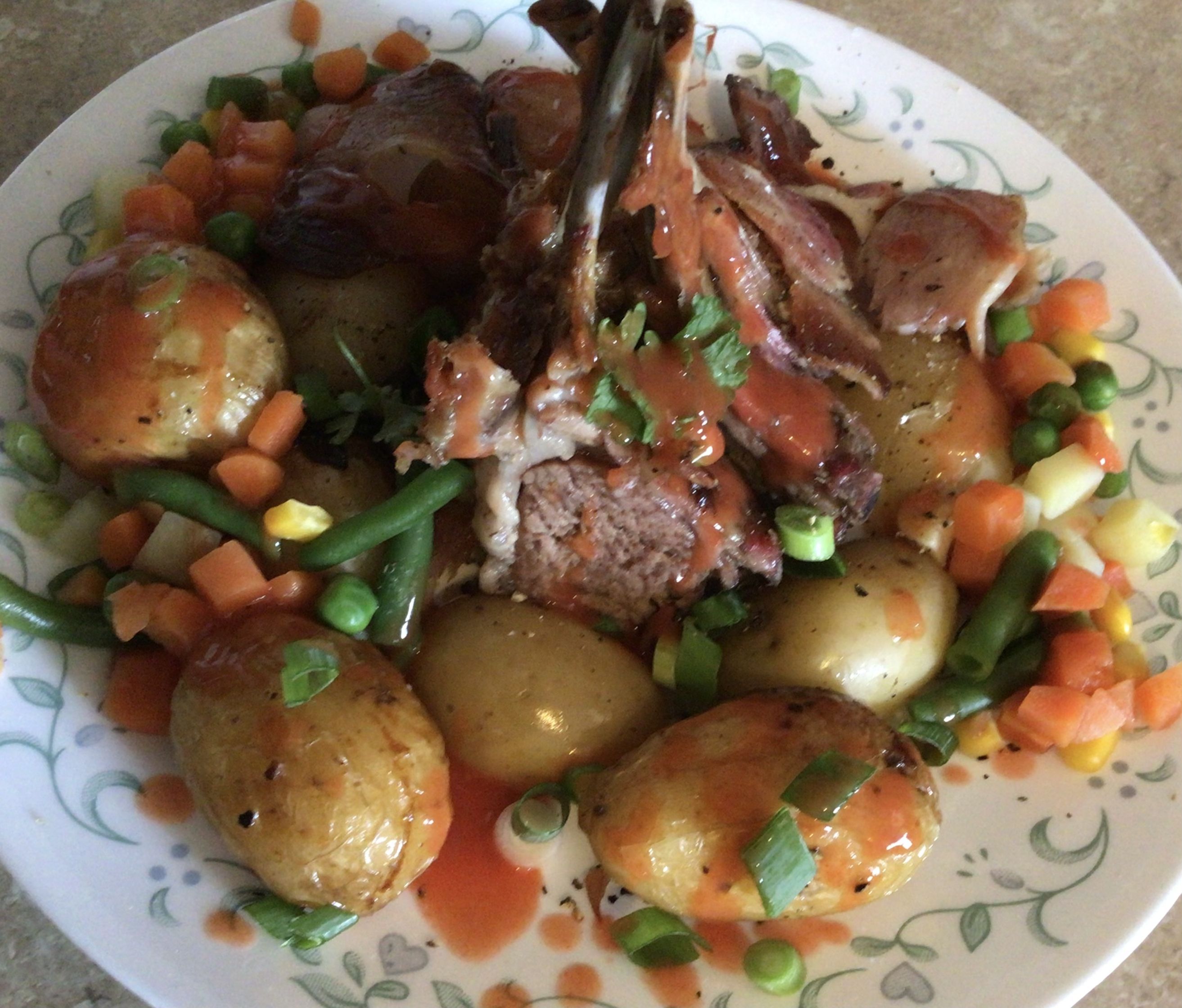Lamb Rack With Baked Potatoes. | bunch