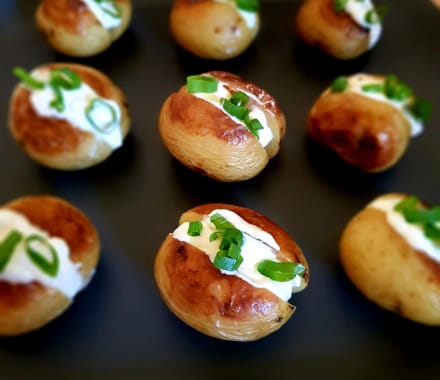 Baby potatoes with sour cream and spring onions | bunch