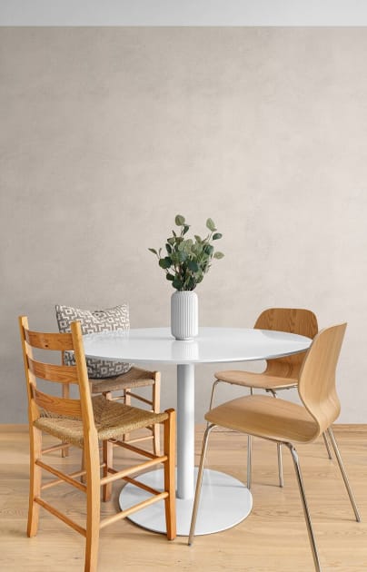 Dining area with a round table mockup