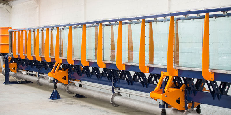 Synchronized system for precision tilting on research flumes