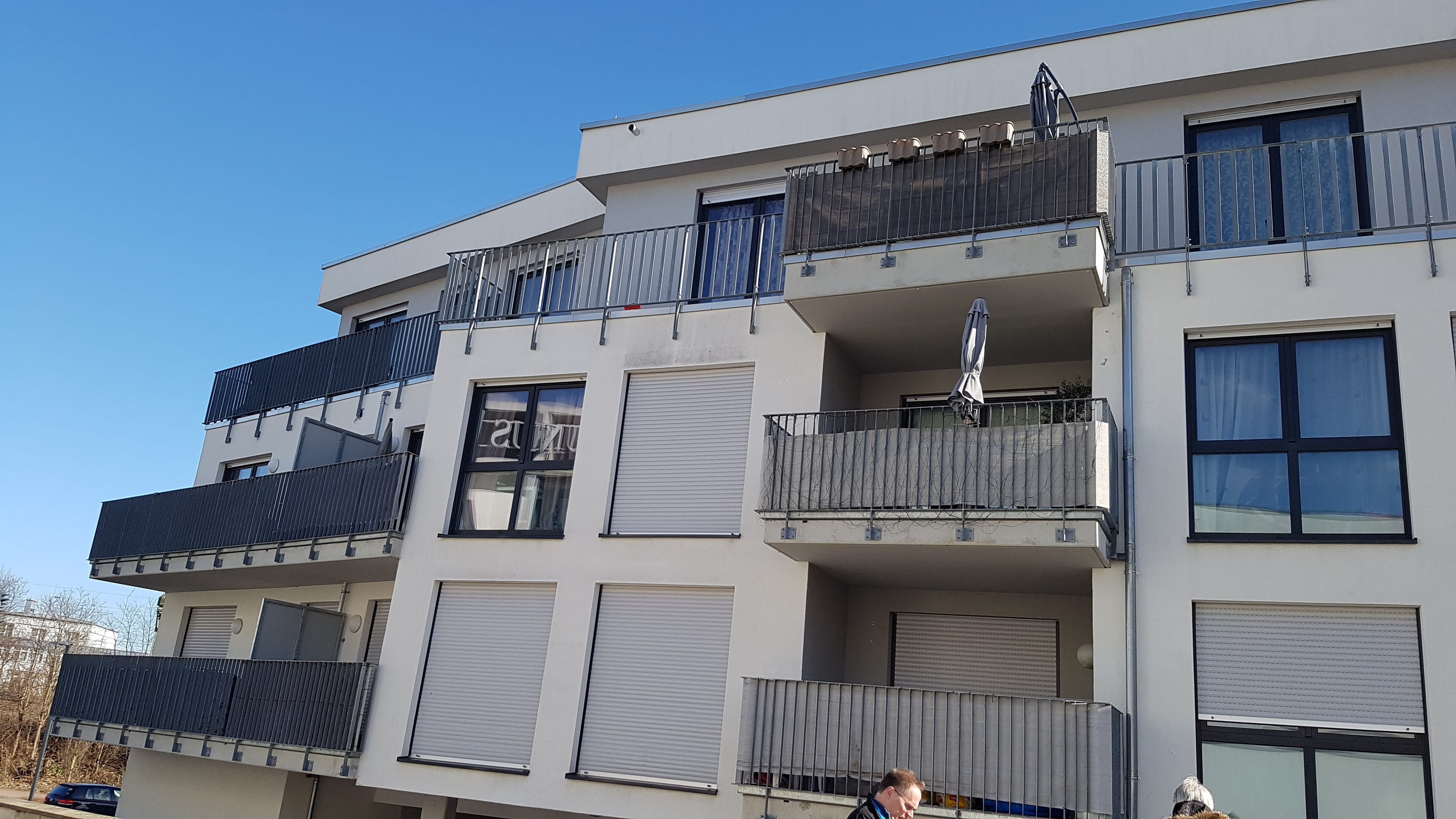Sanierung Sockel Fassade WDVS bei Balkonen und Dachterrassen