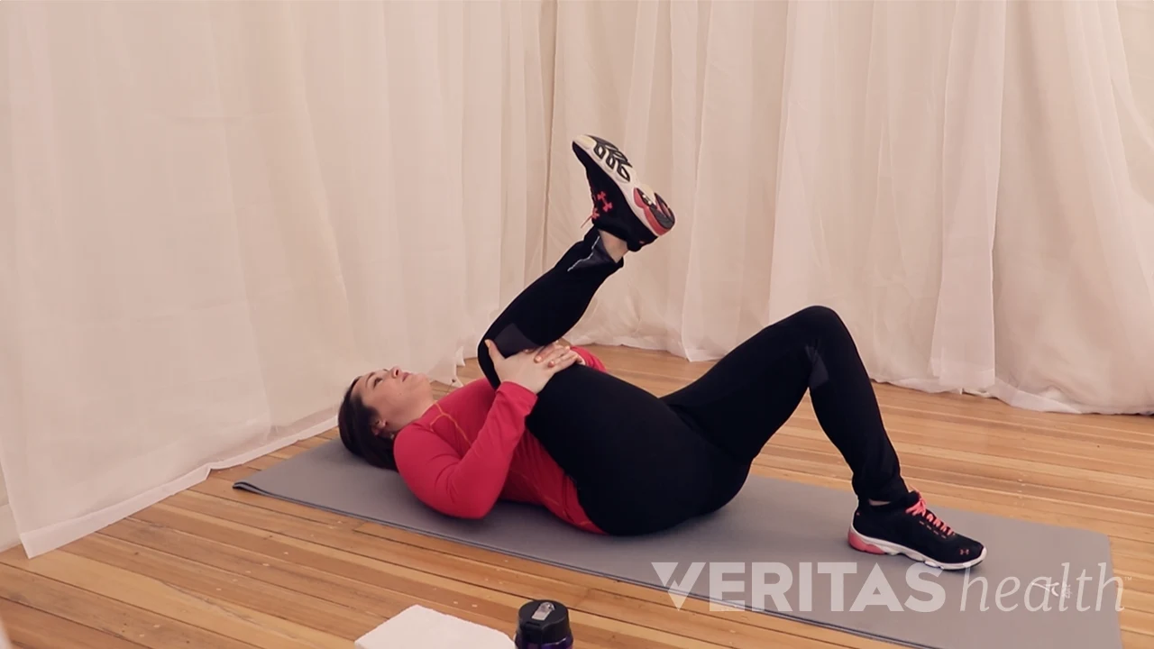 Video: Single Knee to Chest SI Joint Stretch for Sciatic Pain Relief ...