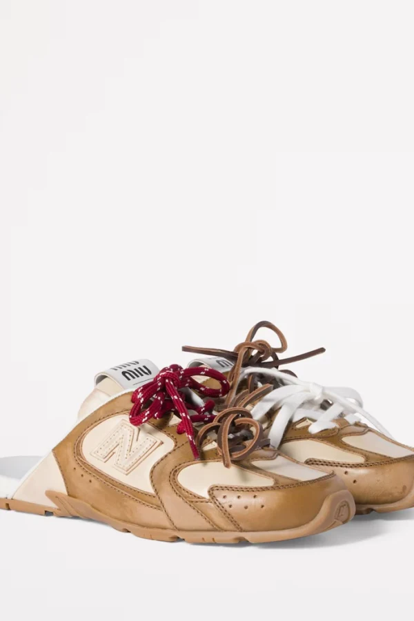 Rent Miu Miu’s elegance meets New Balance’s retro sporty codes. - Miu ...