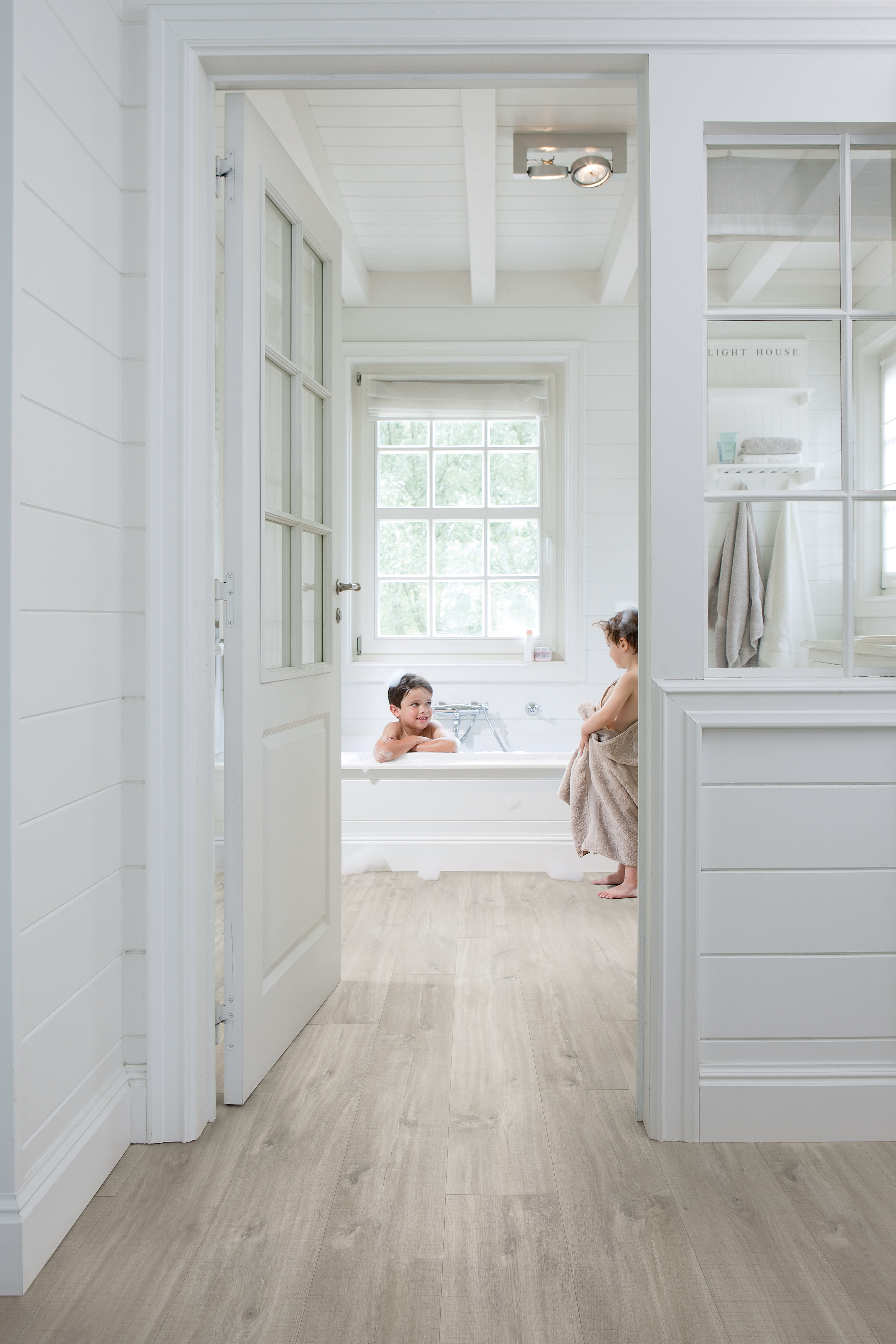 Enhancing natural light with laminate flooring