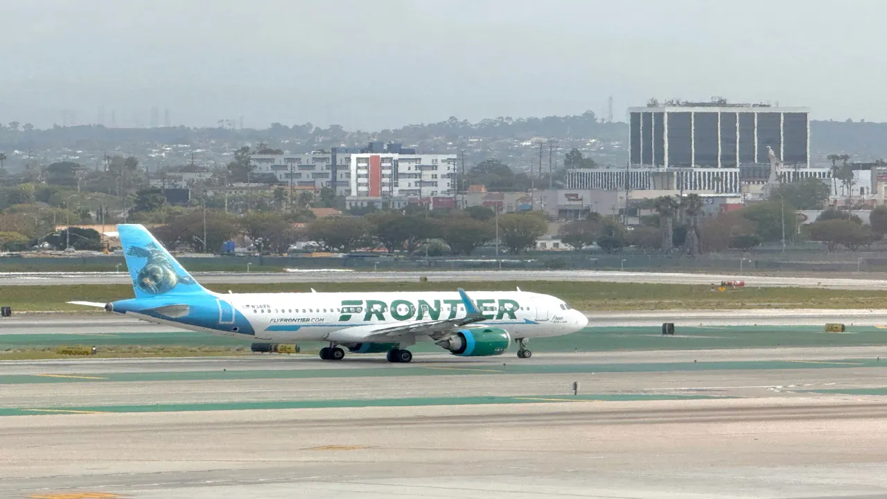 Frontier Airlines LGA Terminal B- Arrivals, Departures, Check‑In & Map ...