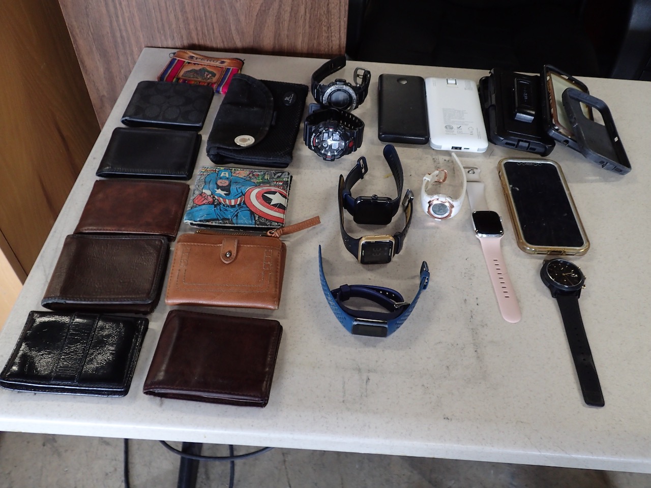 Assorted iPhones, Watches, Wallets | Surplus Marketplace