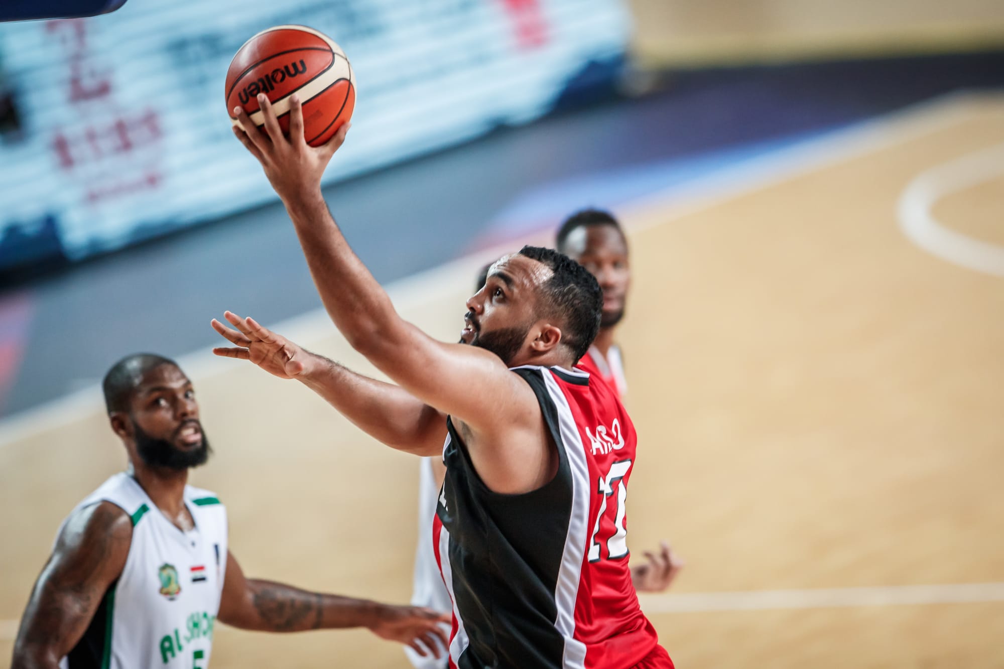 Al Ahli weather late Al Shorta storm | FIBA Basketball