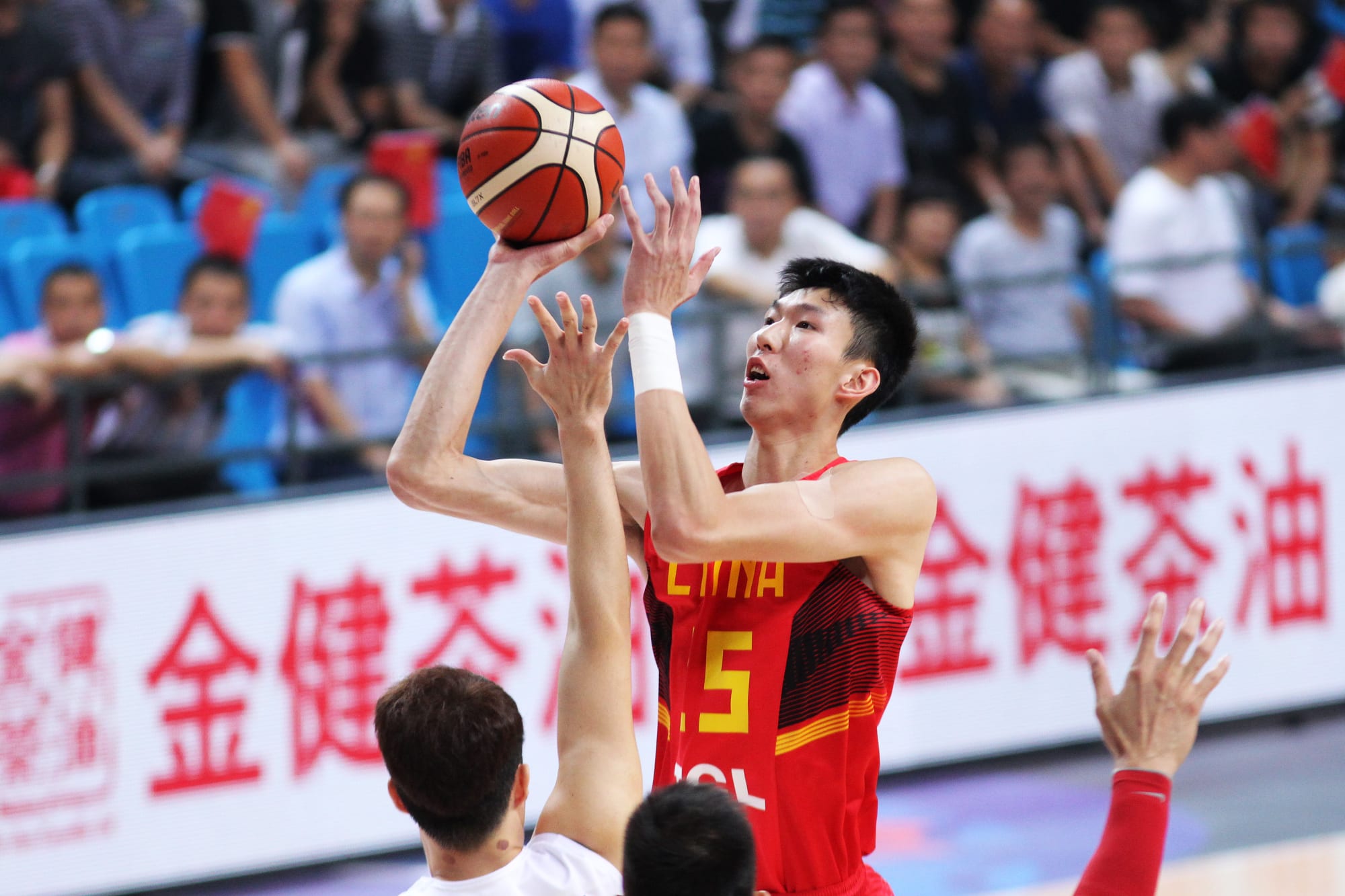Zhou Qi announces his arrival on big stage in style | FIBA Basketball