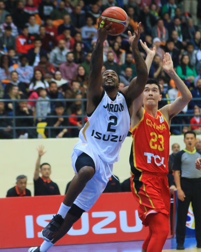 Jordan's terrific trio soars over China in Zhou Qi's debut at Asian ...