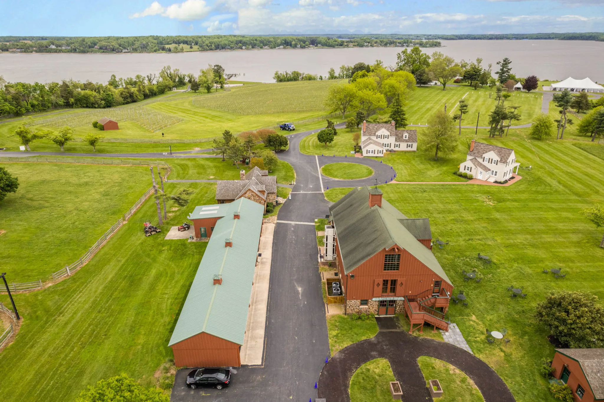 79 Acre Exquisite Waterfront Equestrian Estate with 5 Houses, Vineyard ...