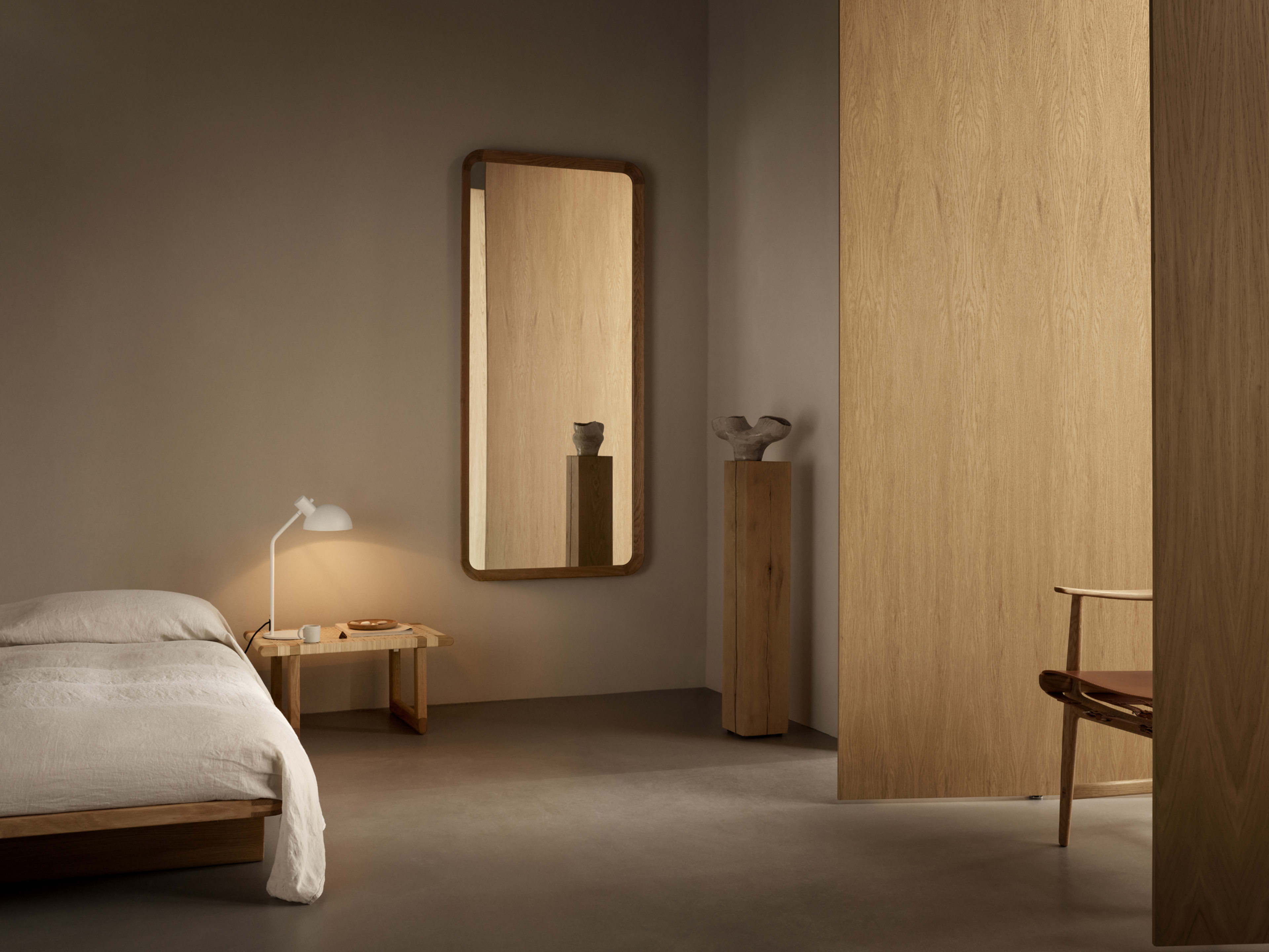 Discover the functionalist Radio House Mirror by Vilhelm Lauritzen