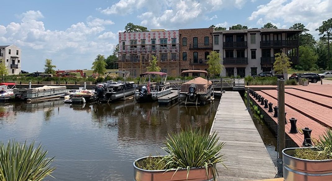 Condominiums on the Marina in Lost Rabbit Town Center - Mass Timber WIN ...