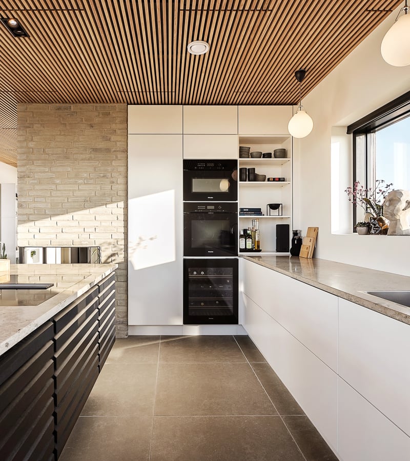 The Classic kitchen has been designed by Danish designer Arne Munch in ...