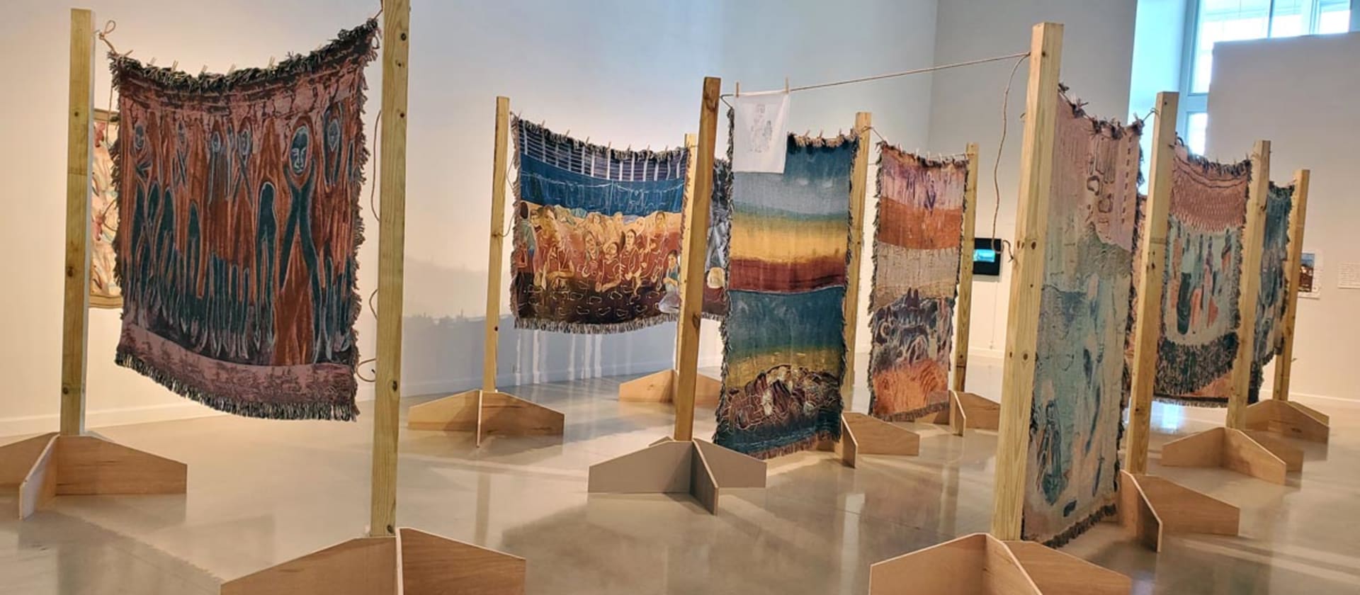 Three generations of FIU artists bring 'Migrating Clotheslines' exhibit ...