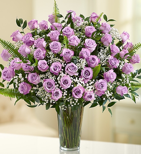 Deluxe Long Stem Purple Roses arranged by a florist in Commack, NY ...