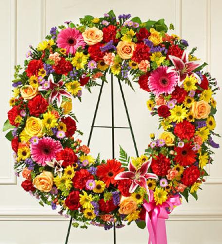 Serene Blessings Bright Standing Wreath arranged by a florist in ...