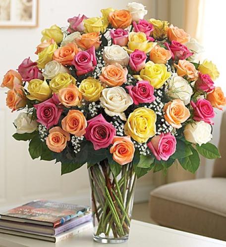 Ultimate Elegance Long Stem Assorted Roses arranged by a florist in ...