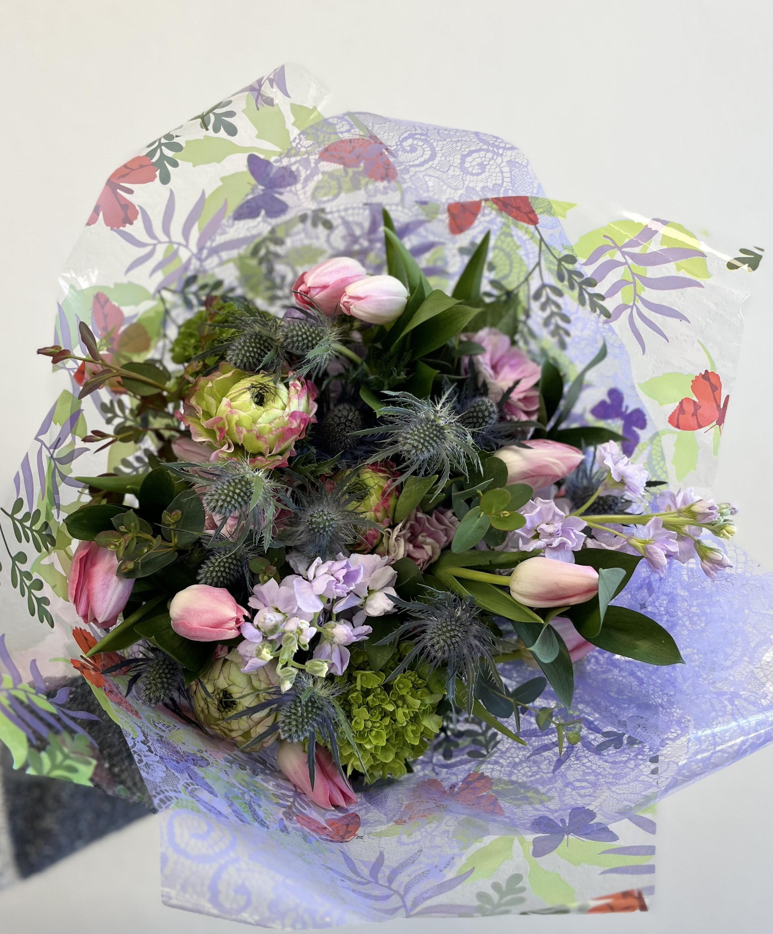 It's a wrap! (florists choice wrapped bouquet) — Garden City Floral ...