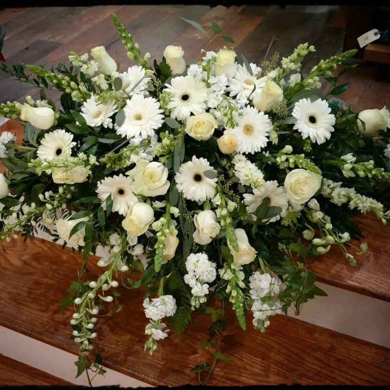 Floral casket covers for funeral and celebration of life service