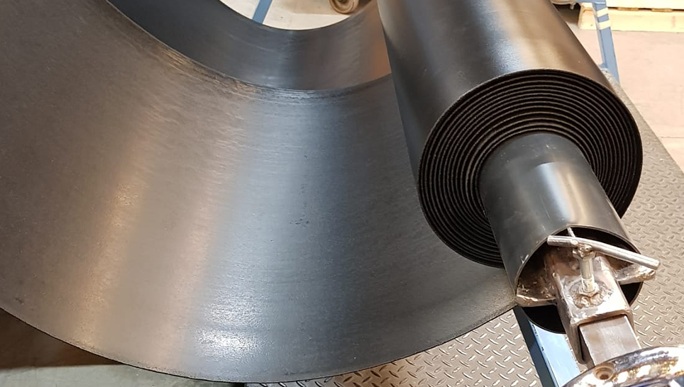 Trackelast material being vulcanised on a Tiflex machine