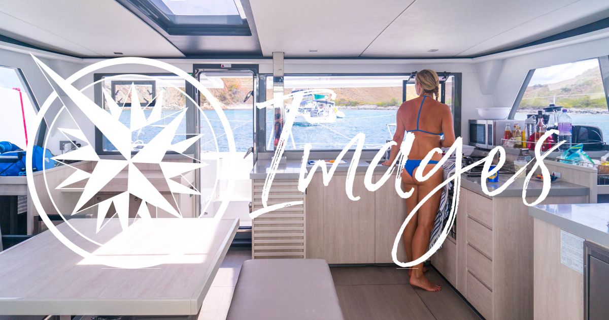 Woman in bikini in sailboat galley - Uncommon Caribbean Images