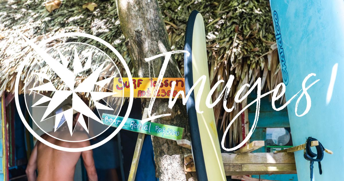 Surf lessons sign with surfers - Uncommon Caribbean Images