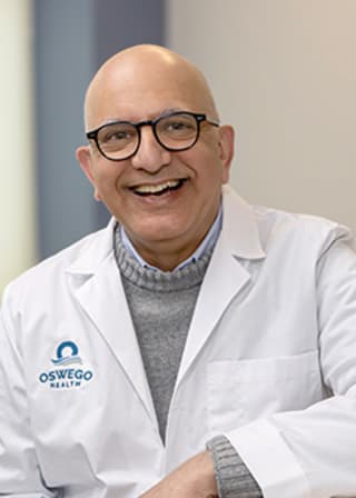 Raman Dhawan, MD