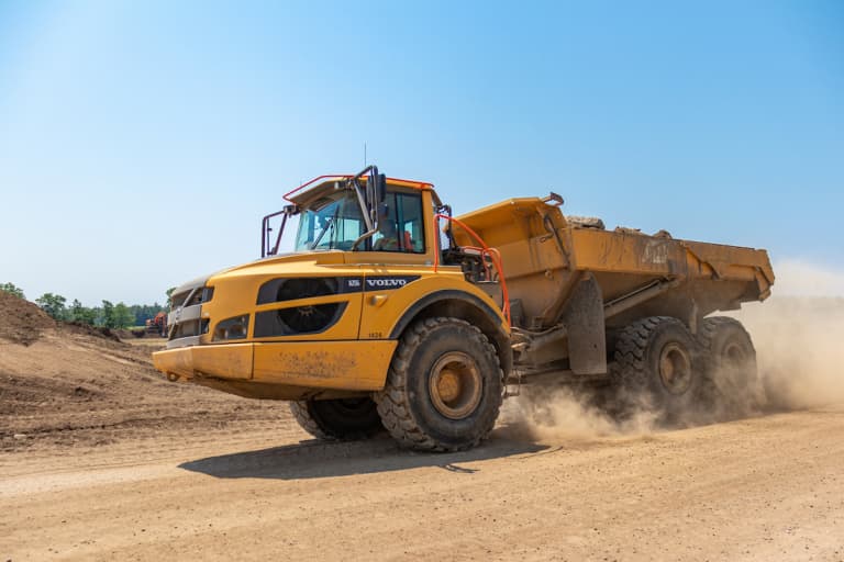 Comparing All Articulated Dump Truck Brands: Who's The Best? | DOZR
