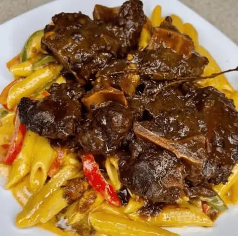 Almost Footprints Rasta Pasta - Caribbean Soul Food