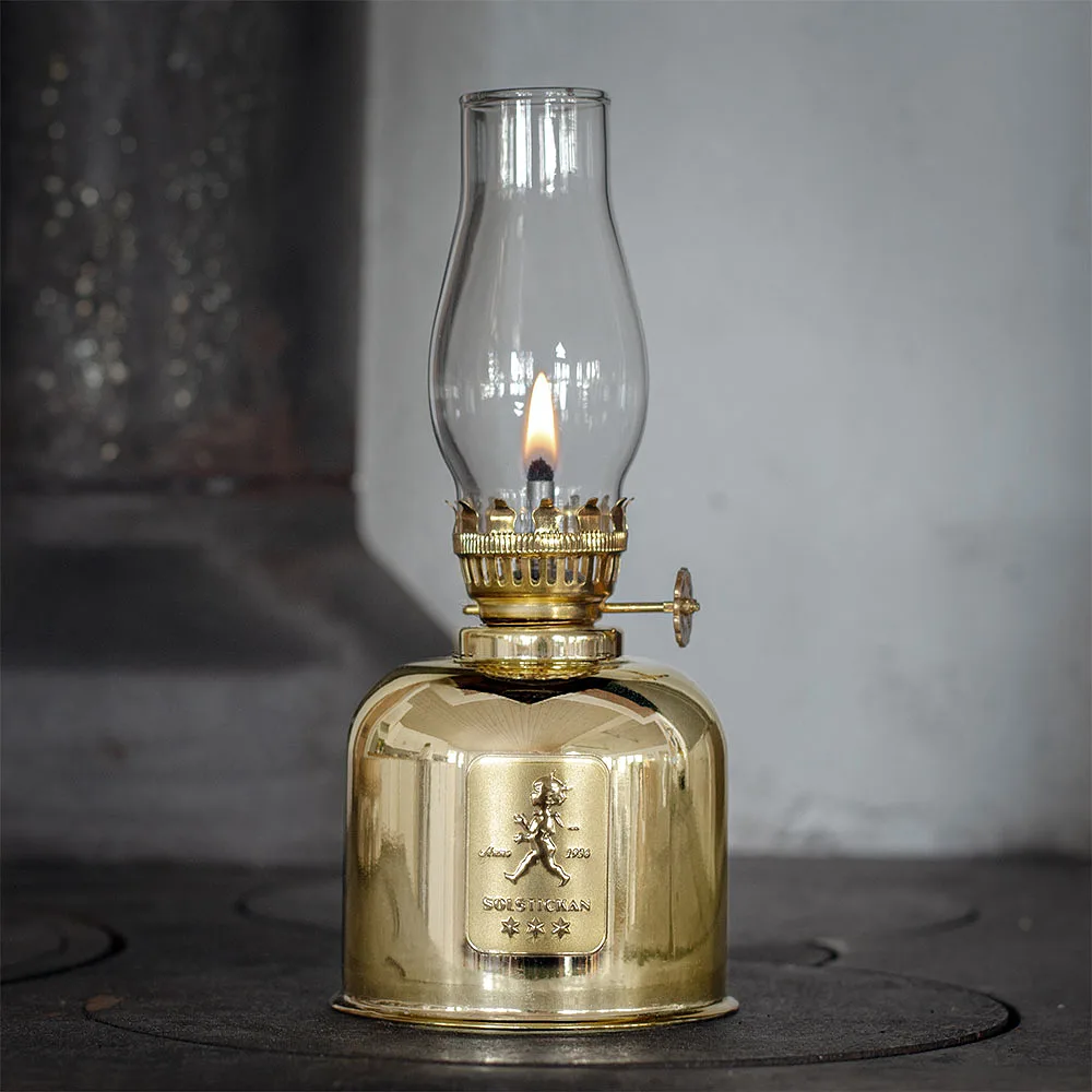 Fotogenlampa Guld Guld från Solstickan Design | Åhléns