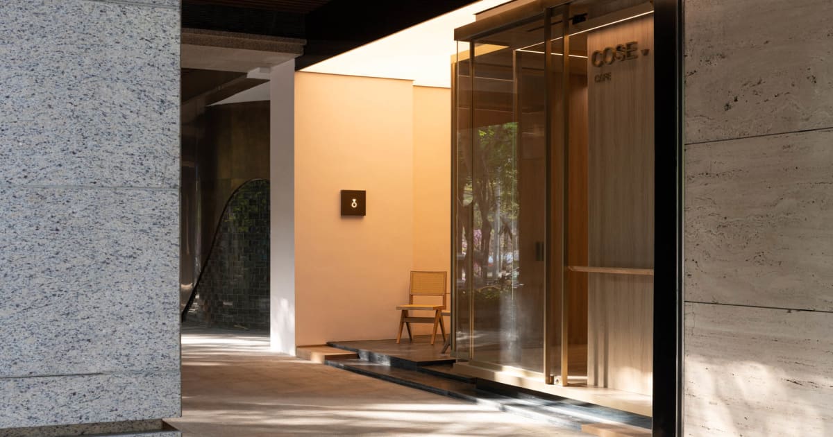 Modern Entrance with Glass Door and Seating | Feel Design
