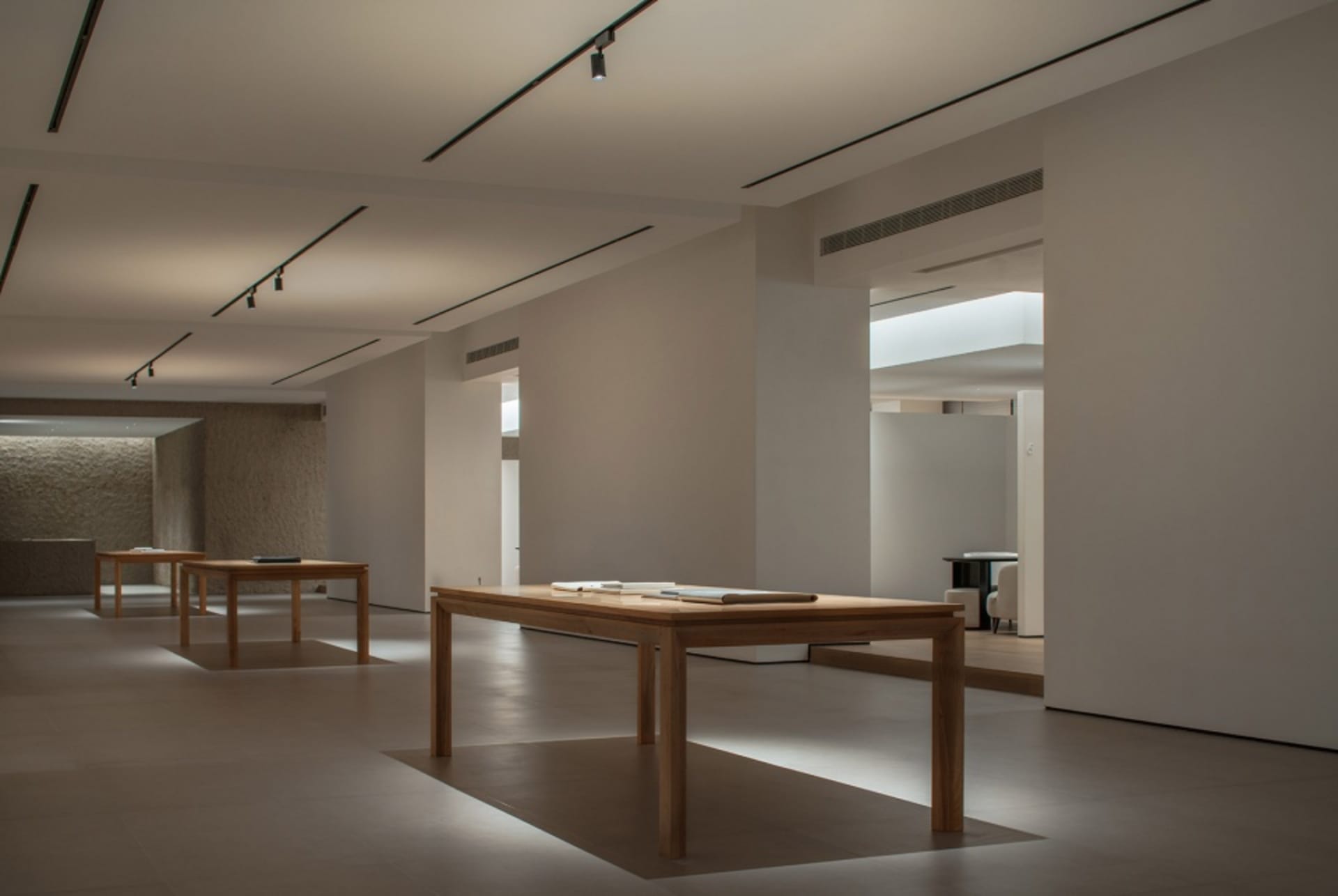 Sparse White Interior with Wood Tables | Feel Design