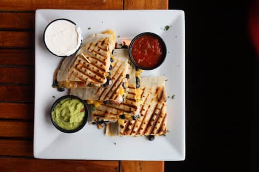 Order from Dogtooth Bar & Grill