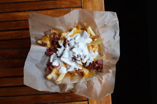 Order Dogtooth Bar & Grill