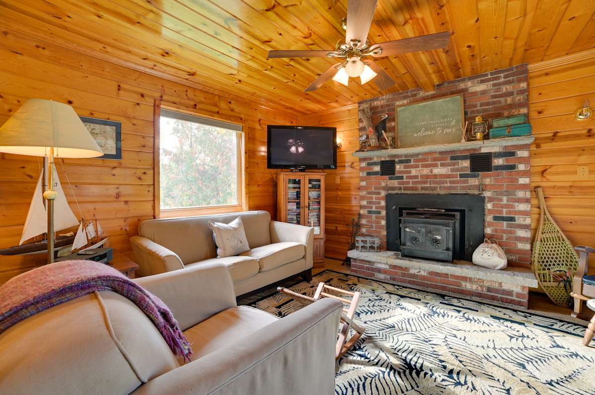 Riverfront Cheboygan Cabin w/ Kayaks & Dock! | Evolve