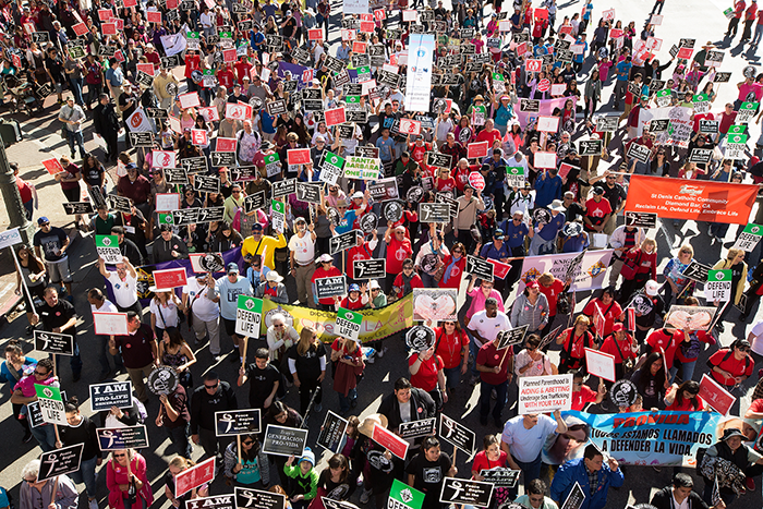 Thousands march to support human dignity in downtown LA
