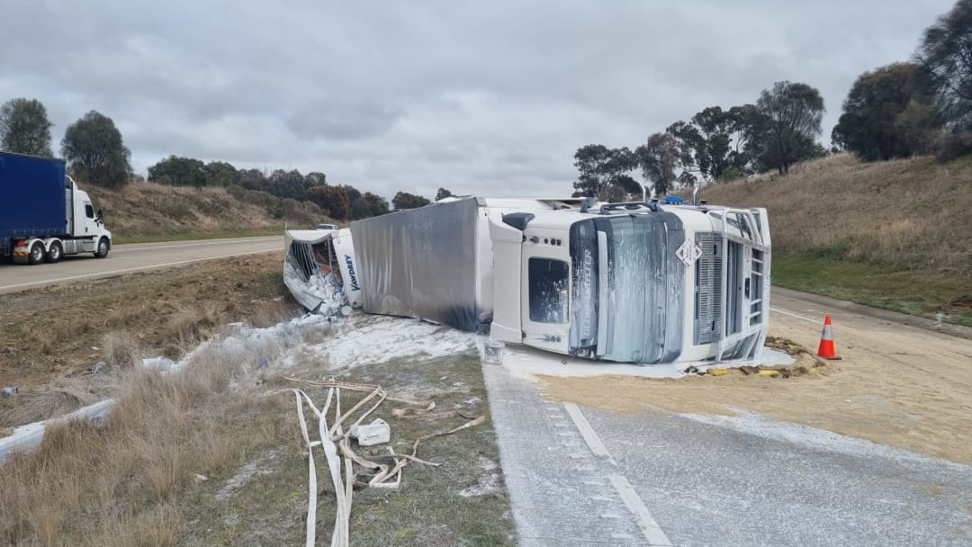 Paint mishap on major highway as truck rolls - Yass - Fire and Rescue NSW