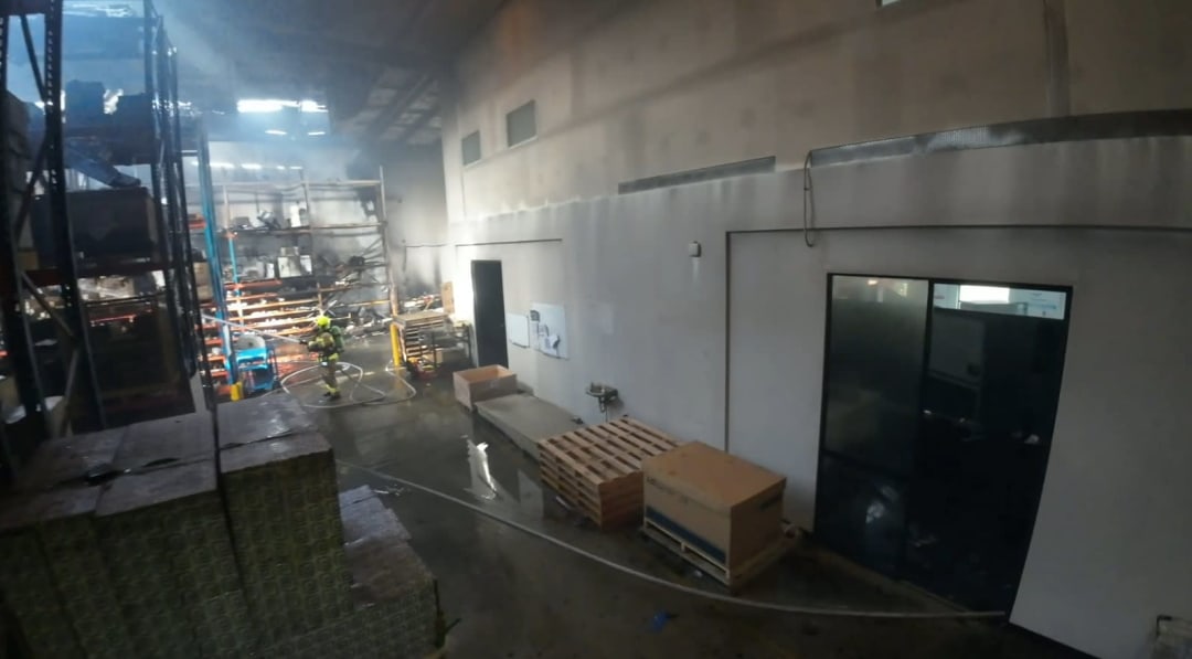 Firefighters stop blaze spreading to Lithium-Ion battery storage site ...