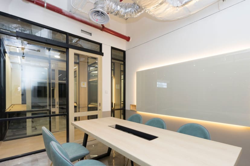 6-Person Meeting Room 9E at GoWork RDTX Square | Gable